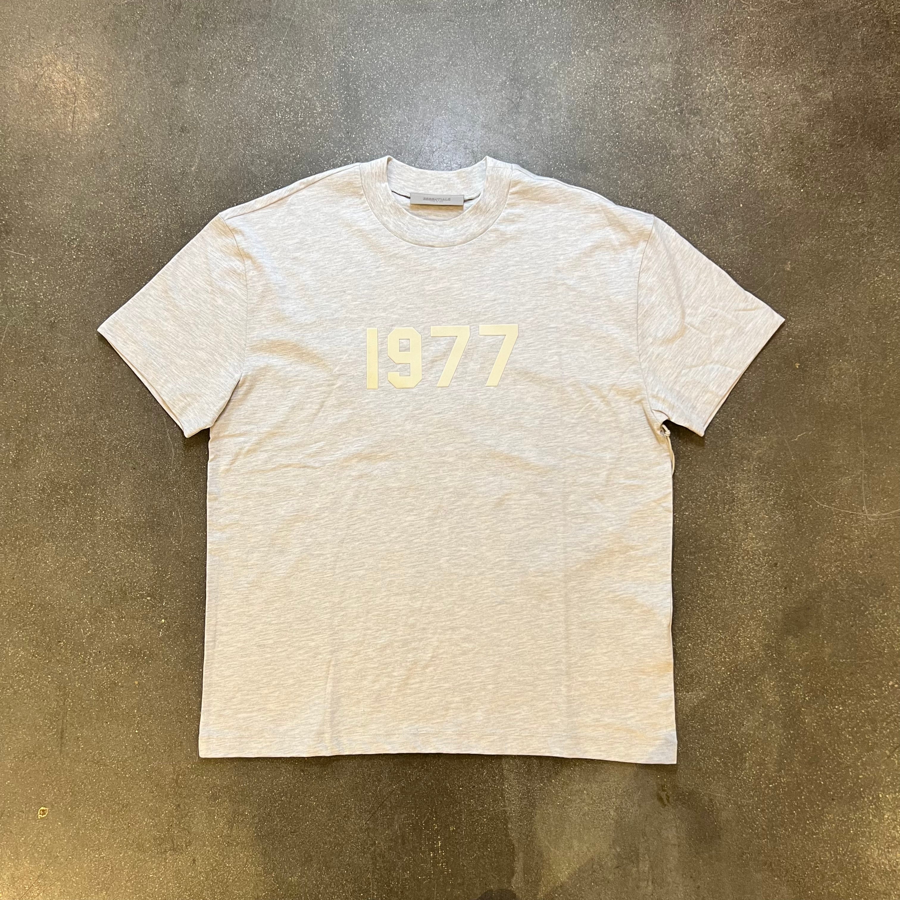 Fear of God Essentials 1977 T-shirt Light Oatmeal – FABULOUS ...